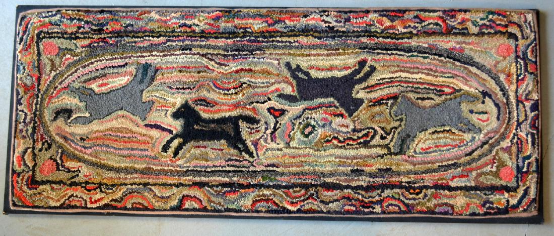 Folk art hooked rug depicting horses running around