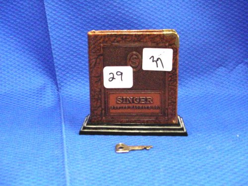 29: SINGER SEWING MACHINE BOOK BANK