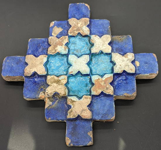 An 18th century Indian Multan tile with raised geometric designs, 24cm ...