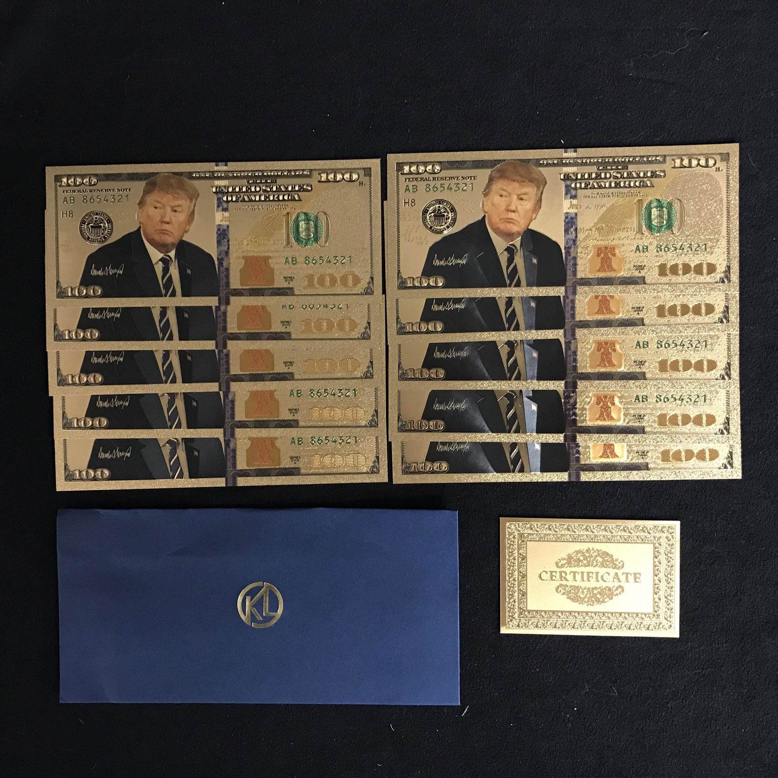 Two Donald J. Trump 24k Gold Plated Collectors $100