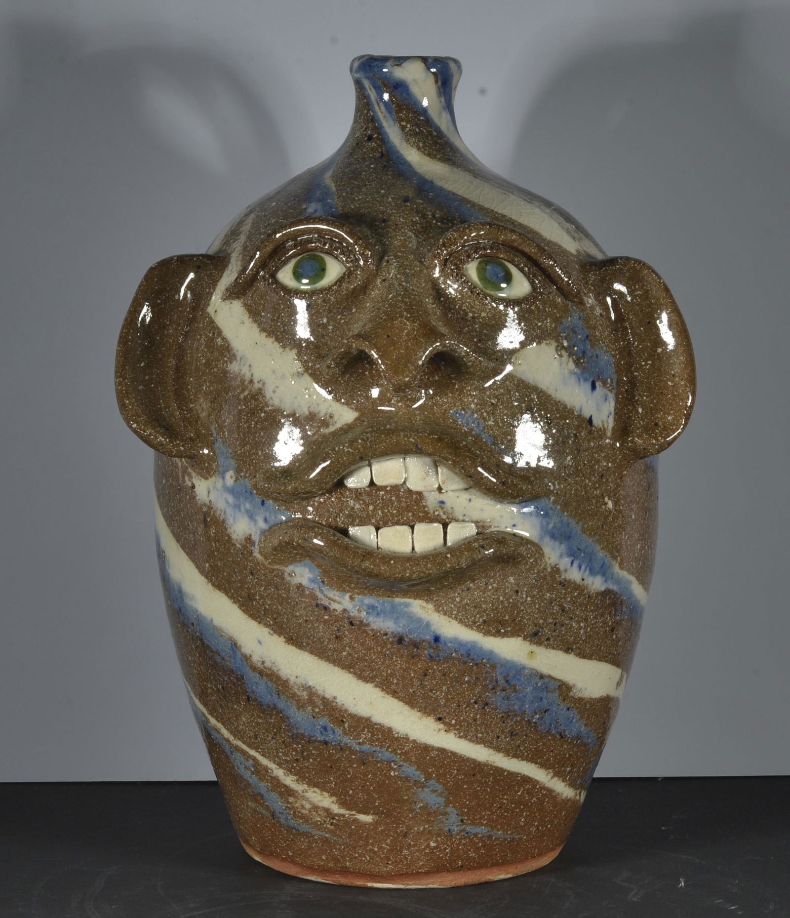Joe Reinhardt Pottery Swirl Face Jug