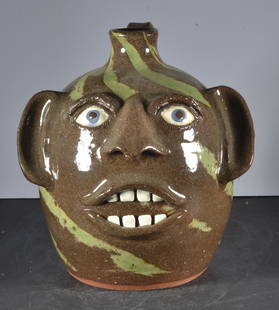 Joe Reinhardt Pottery Swirl Face Jug