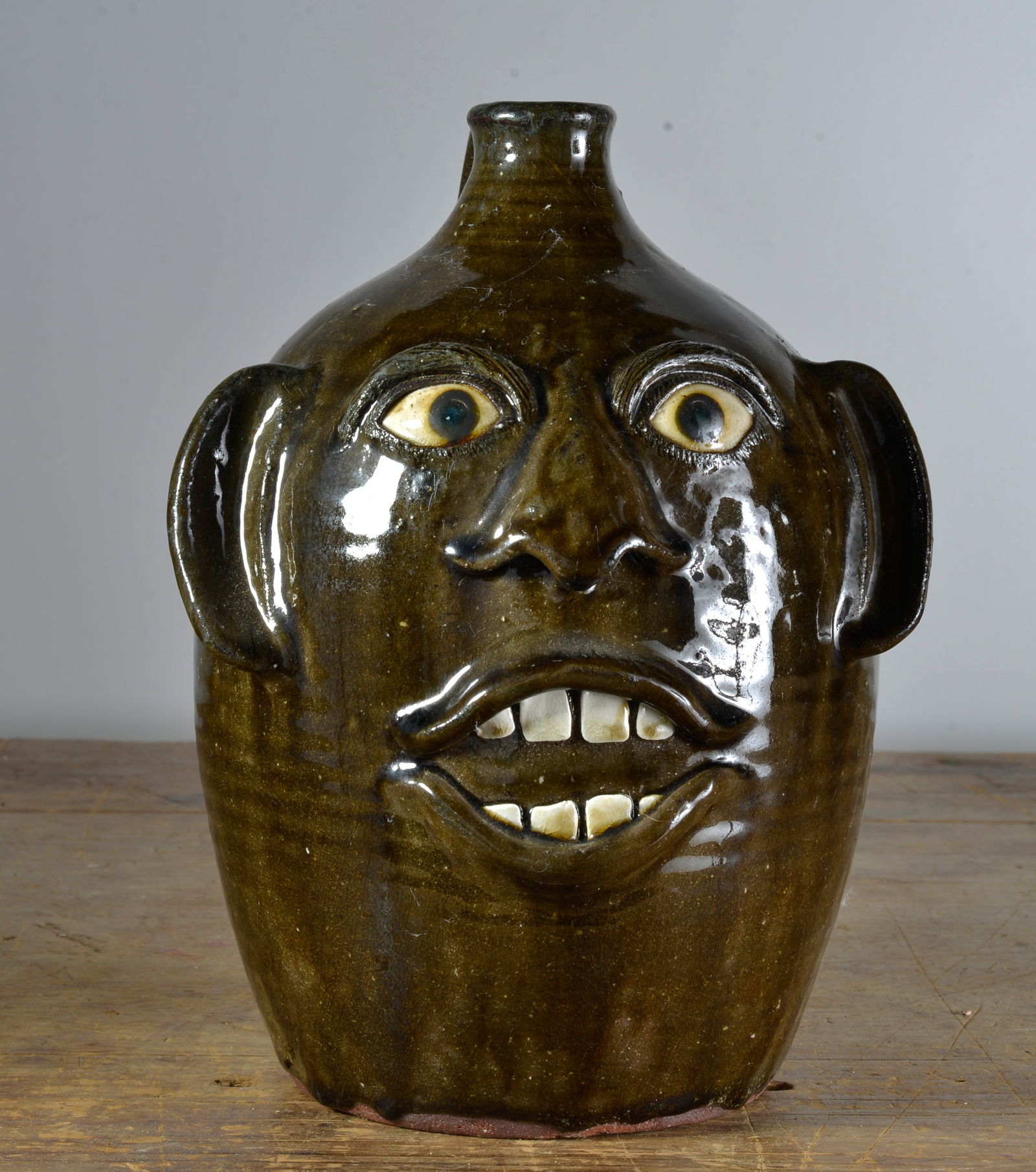 Joe Reinhardt Double Handle Face Jug Auction