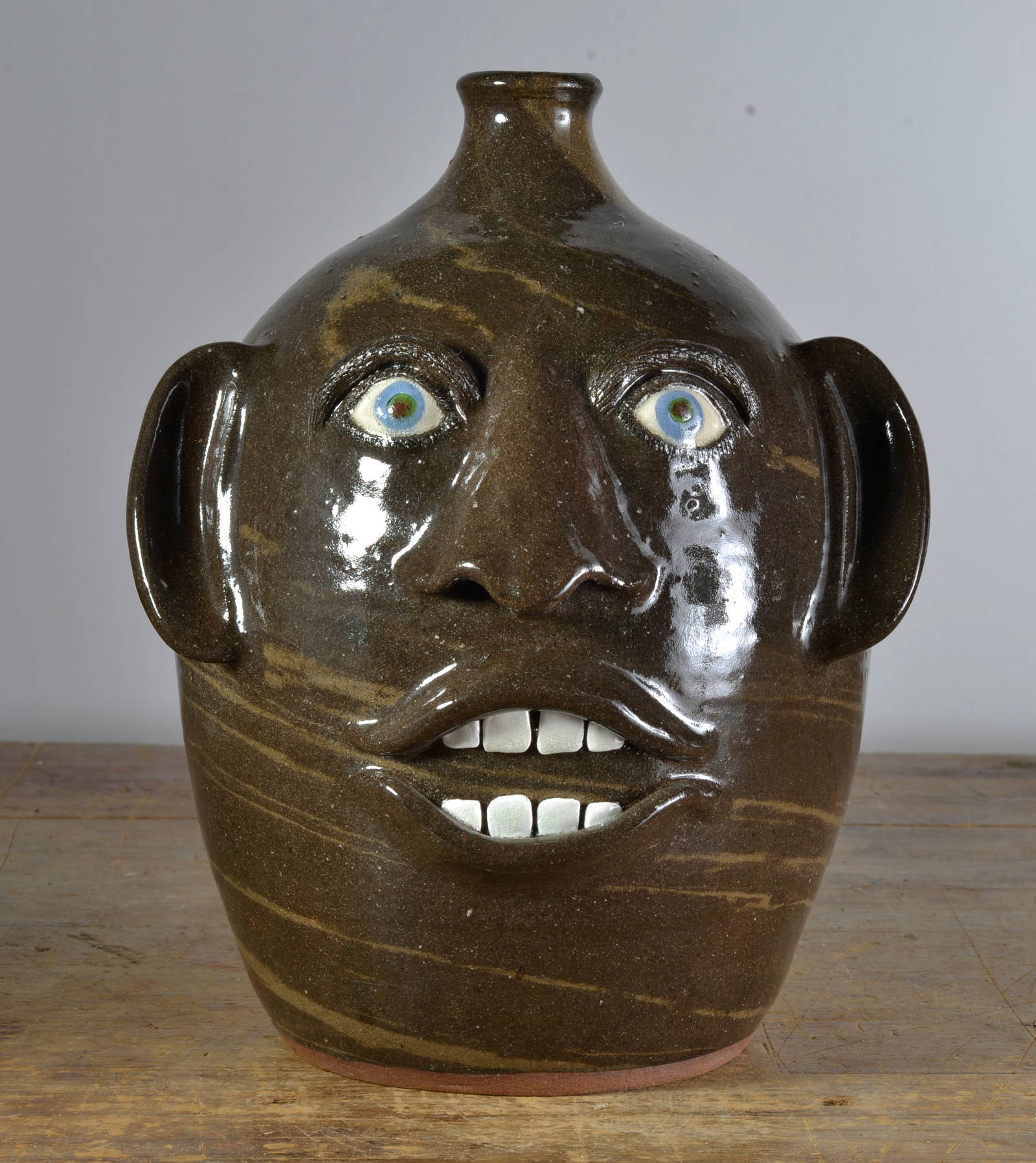 Joe Reinhardt Swirl Face Jug Auction