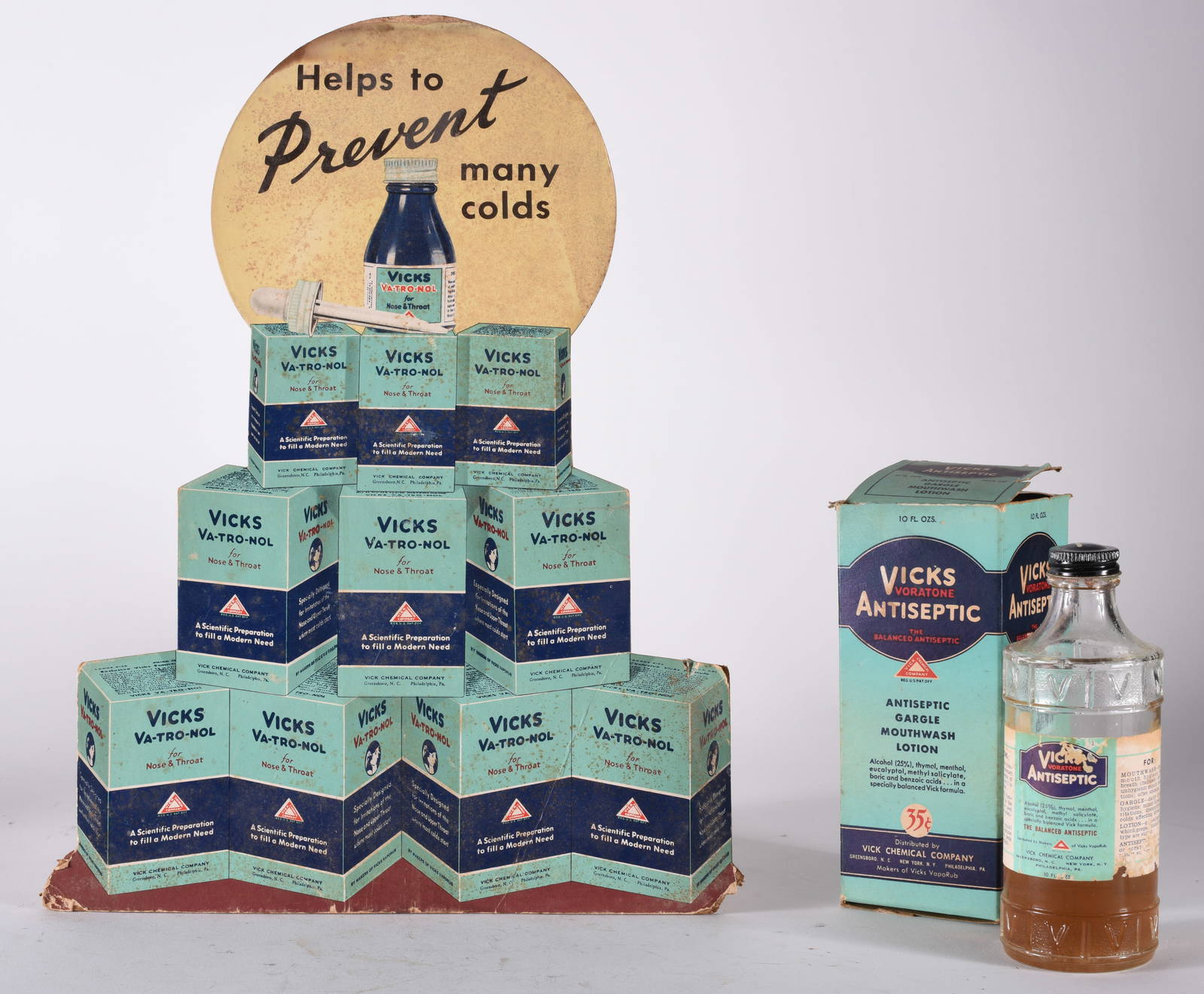 Antique Vicks Counter Display And Bottle Auction