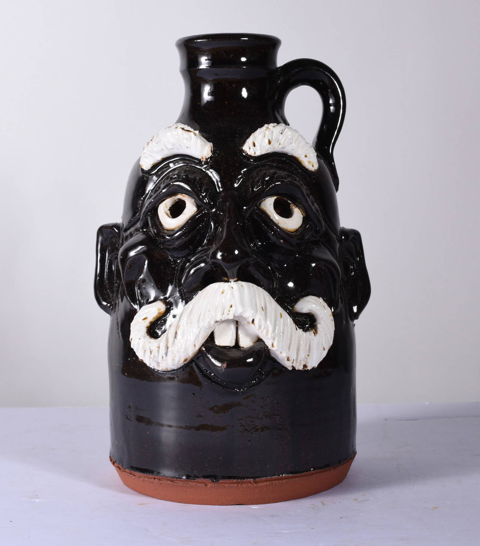 Robin Rodgers Face Jug Auction