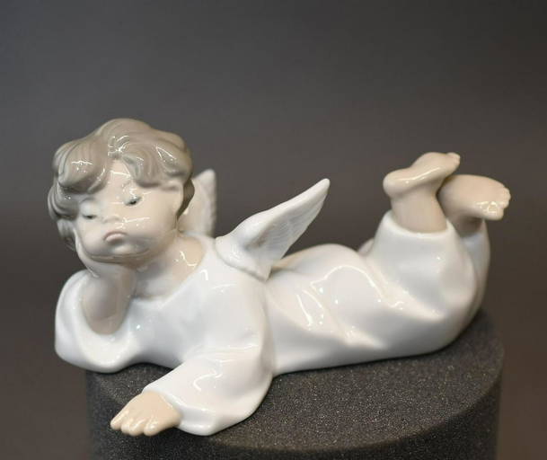 Lladro "angel Laying Down"