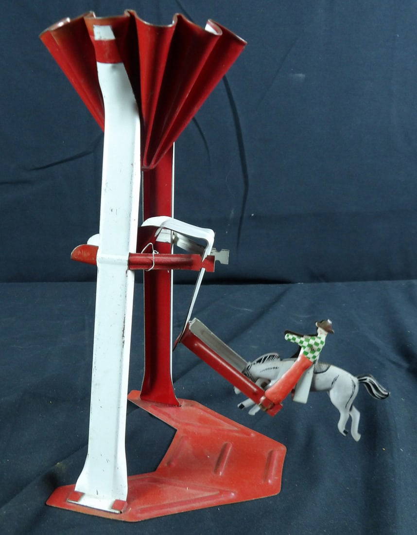 1950's A. Rowley Rhythm Klippity Klop Cowboy Sand Tin Toy Auction