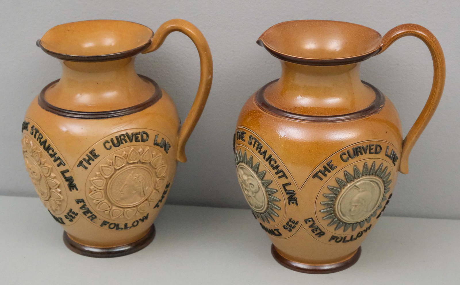 Pair Of Doulton Lambeth Pottery Motto Jugs Auction