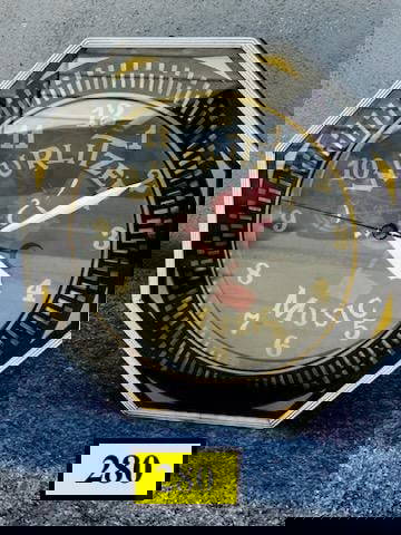 Wurlitzer Music Lighted Spinner Clock Auction