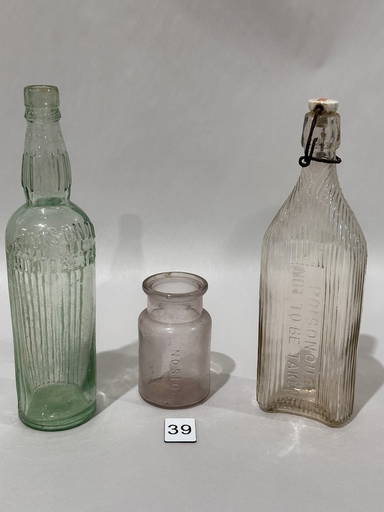 3 Clear Poison Bottles