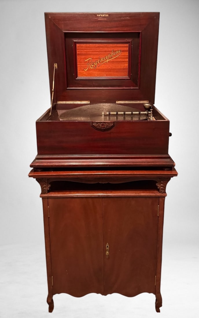 Reginaphone 20-3/4" Disc Music Box And Cabinet Auction