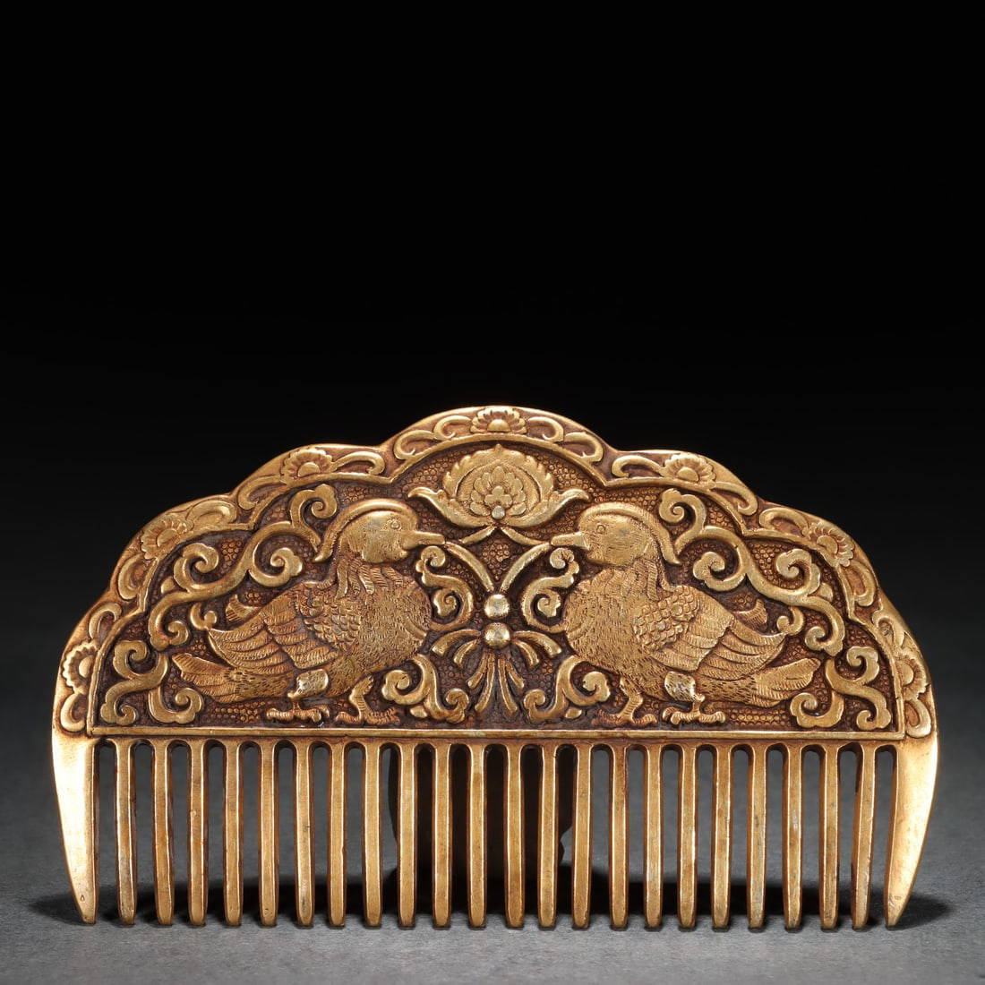 A Gilt Copper Comb Auction