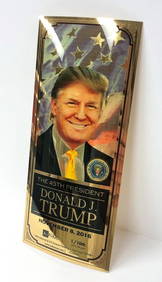 Two Donald J. Trump 24k Gold Plated Collectors $100