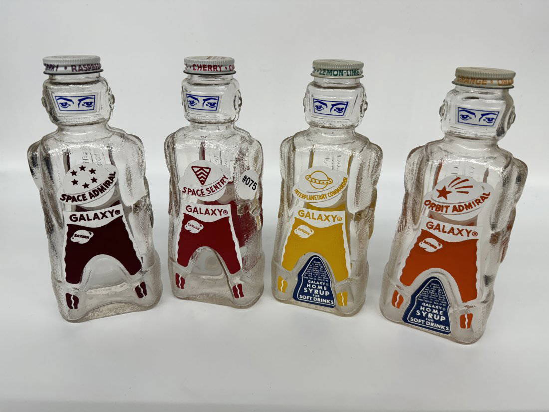 4 Galaxy Soft Drink Syrup Bottles Auction