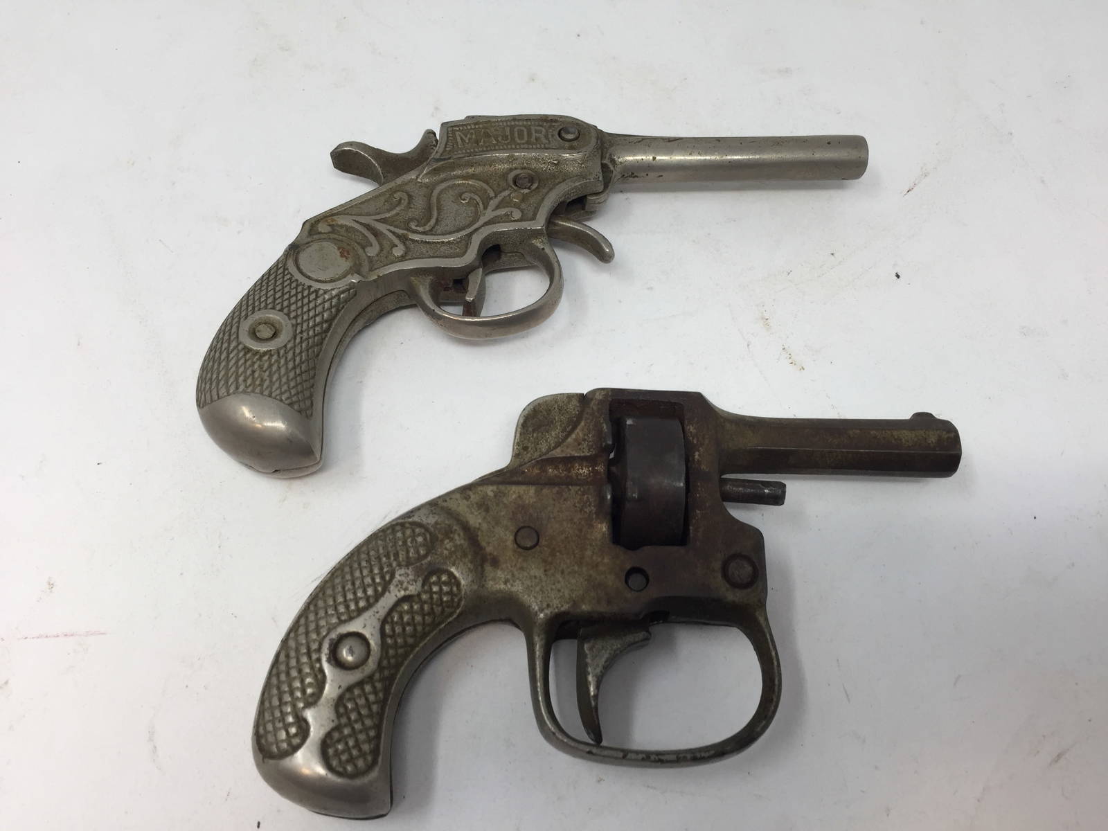 2 Antique Cap Guns Auction