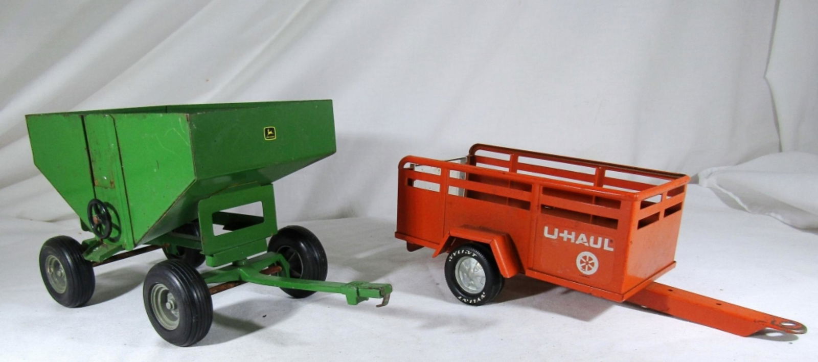 (2) Metal Toy Wagons: U Haul & John Deere