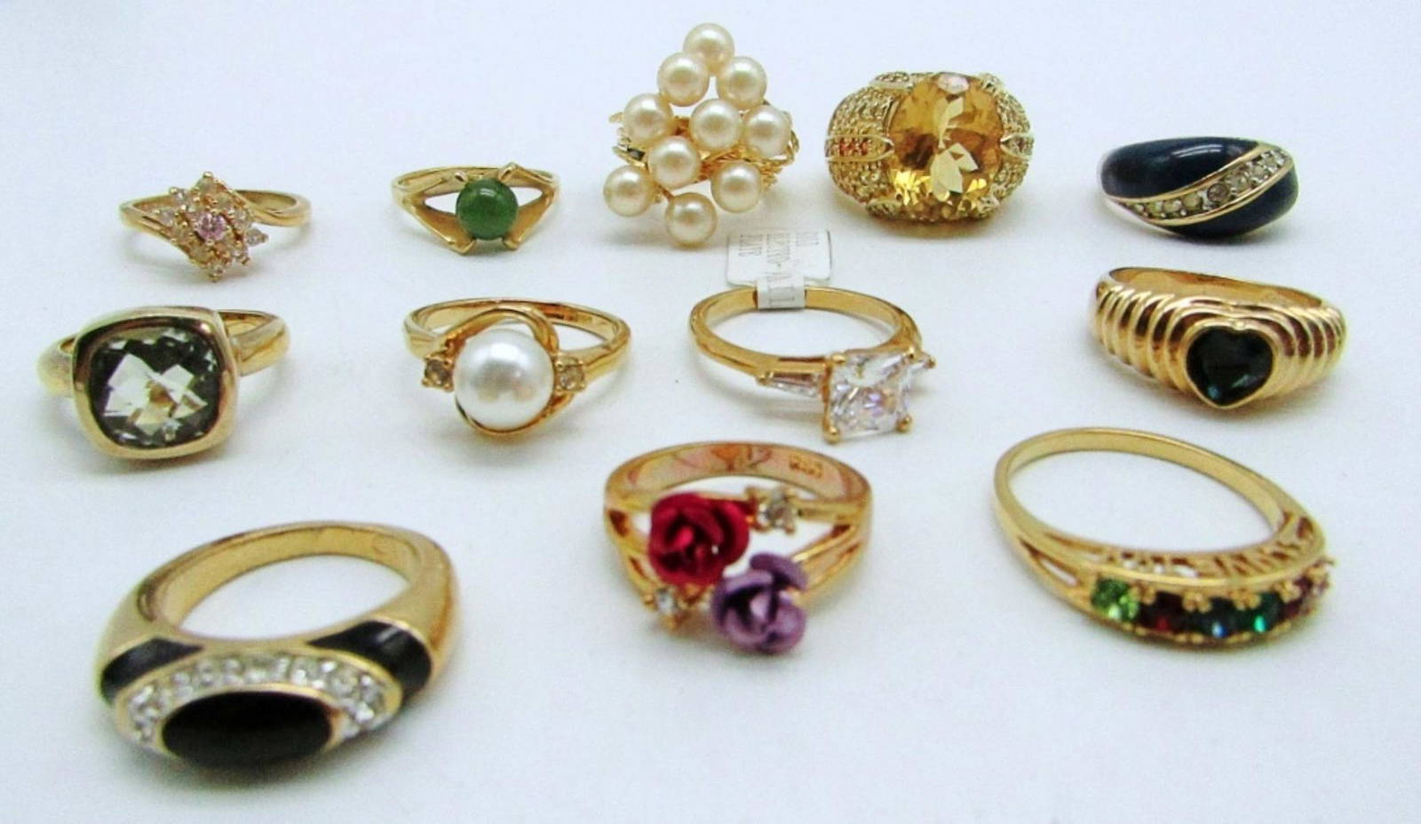 13 Gold Tone Rings Auction
