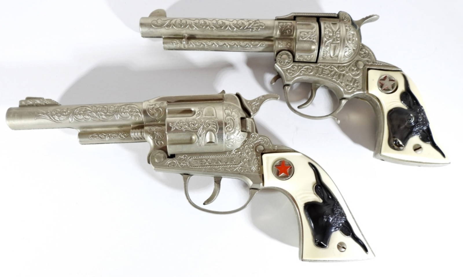 (2) Hubley Texan Jr Cap Guns Auction