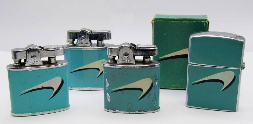 (4) Newport Advertising Lighters