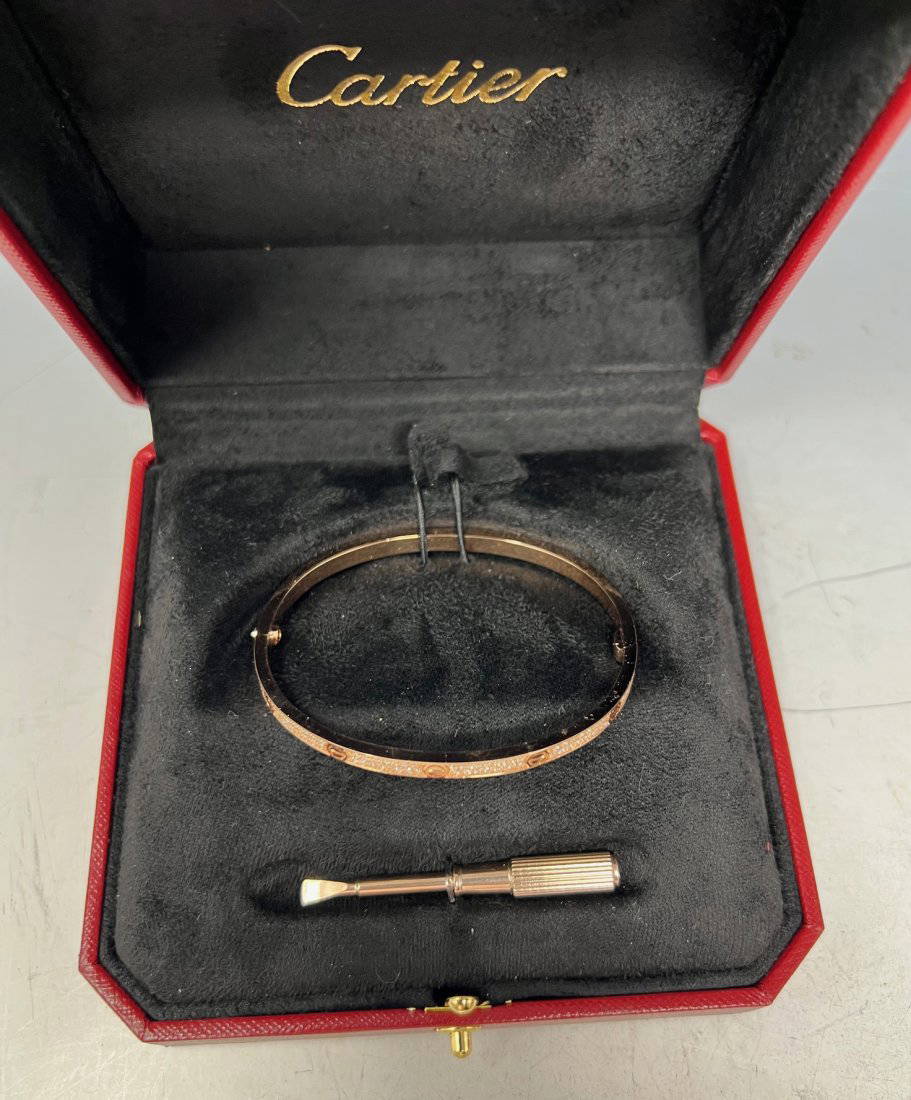 Cartier Gold Bangle With Diamond Inlays Auction