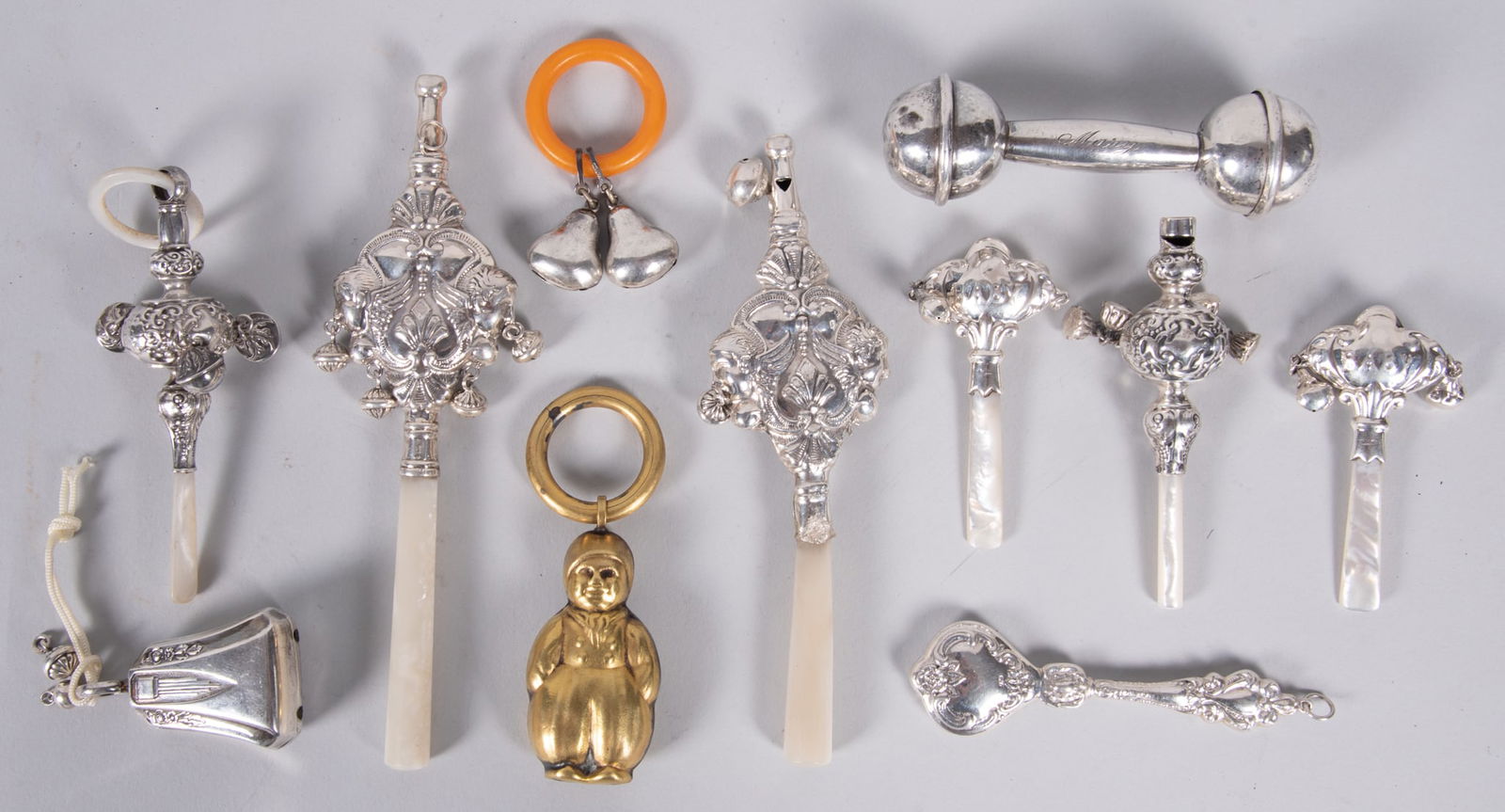 A Large Collection Of Sterling Silver Baby Rattles Auction