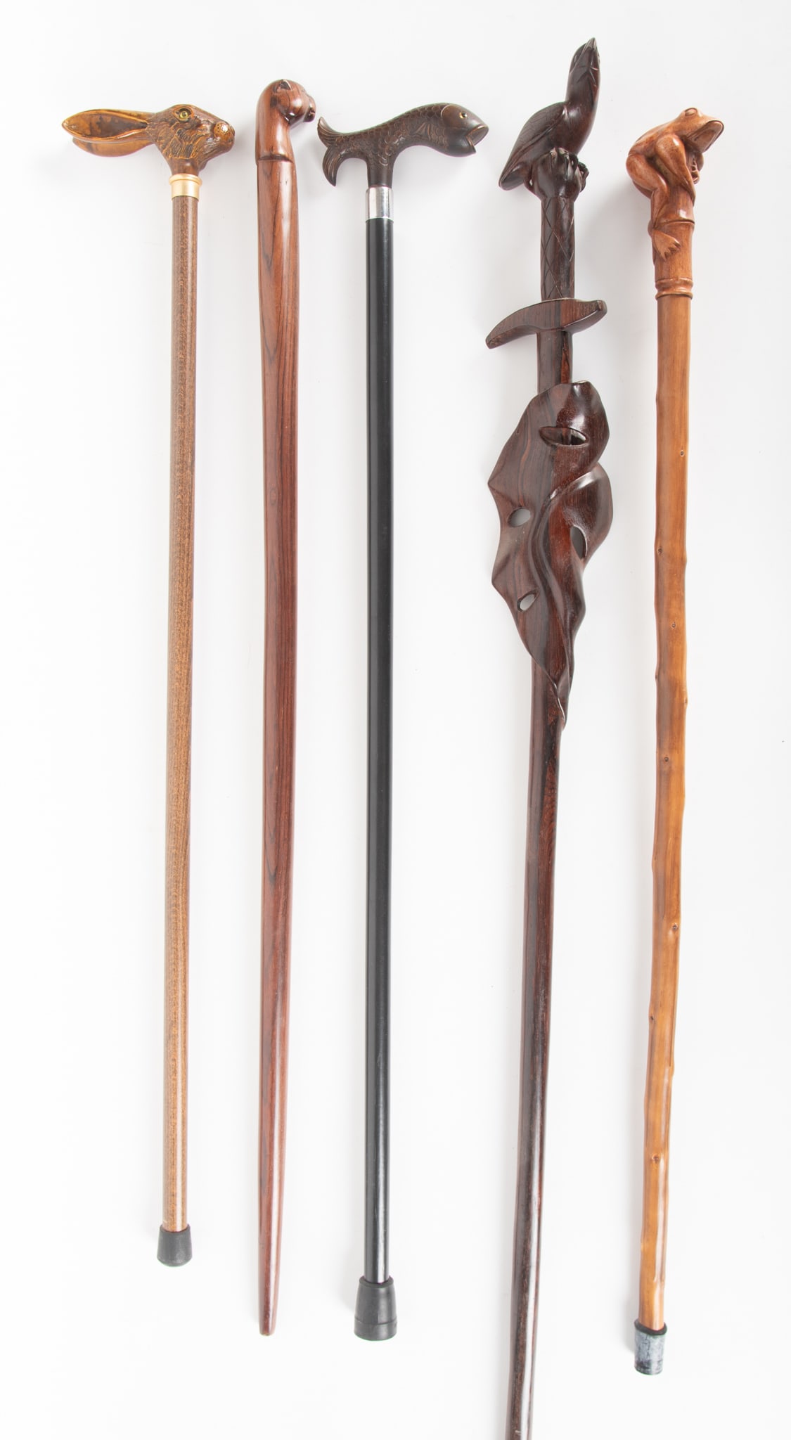 Collection Of Five Hand Carved Walking Sticks Auction