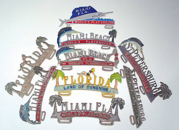 Nine Original Florida License Plate Toppers