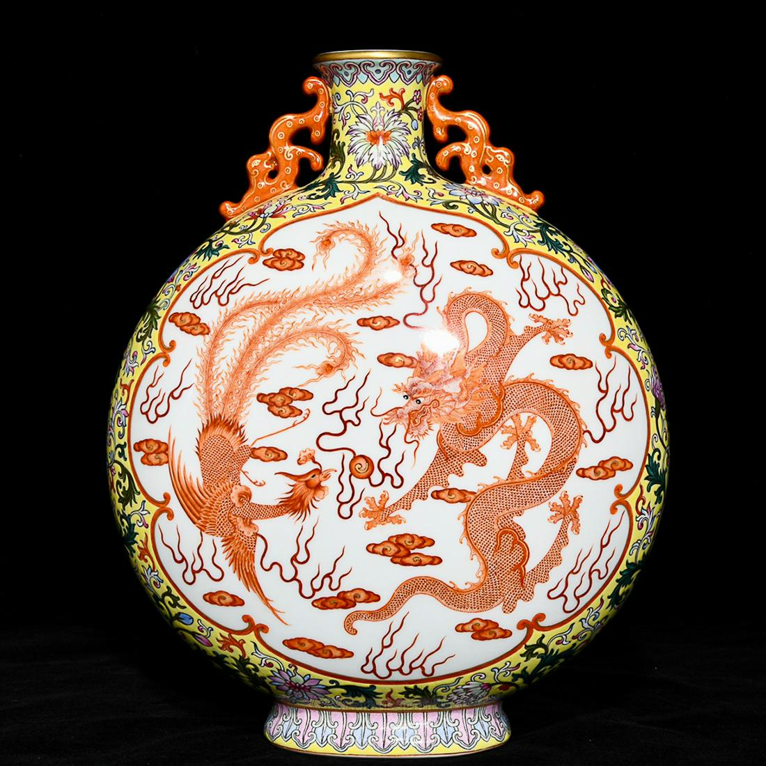 CHINESE IRON-RED ENAMELED HANDLED VASE, 'DRAGON AND PHOENIX', 'QING ...