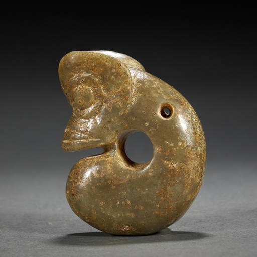 A Russet Jade 'pig Dragon' Carving Neolithic Period,