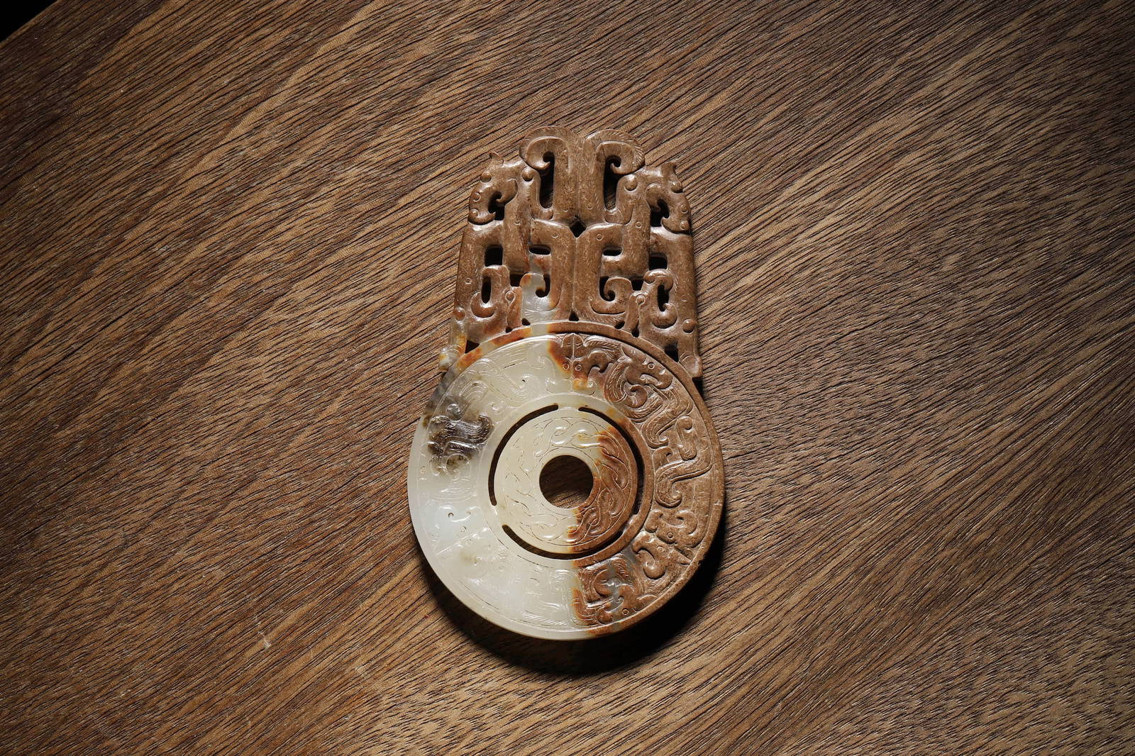 A White And Russet Jade Dragon Bi Disc Auction