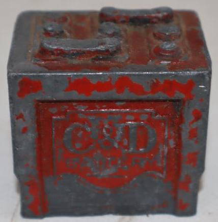 C&d Cast Battery Shaped Paperweight Auction