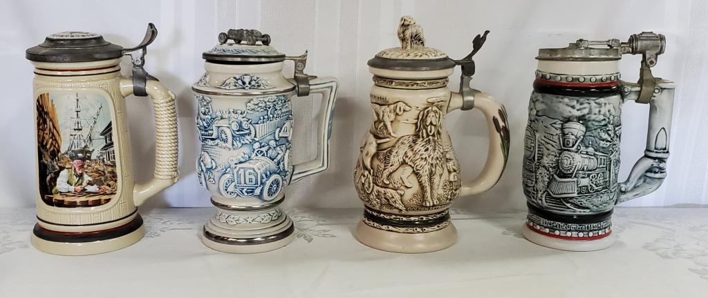 4 Collectible Avon Beer Steins