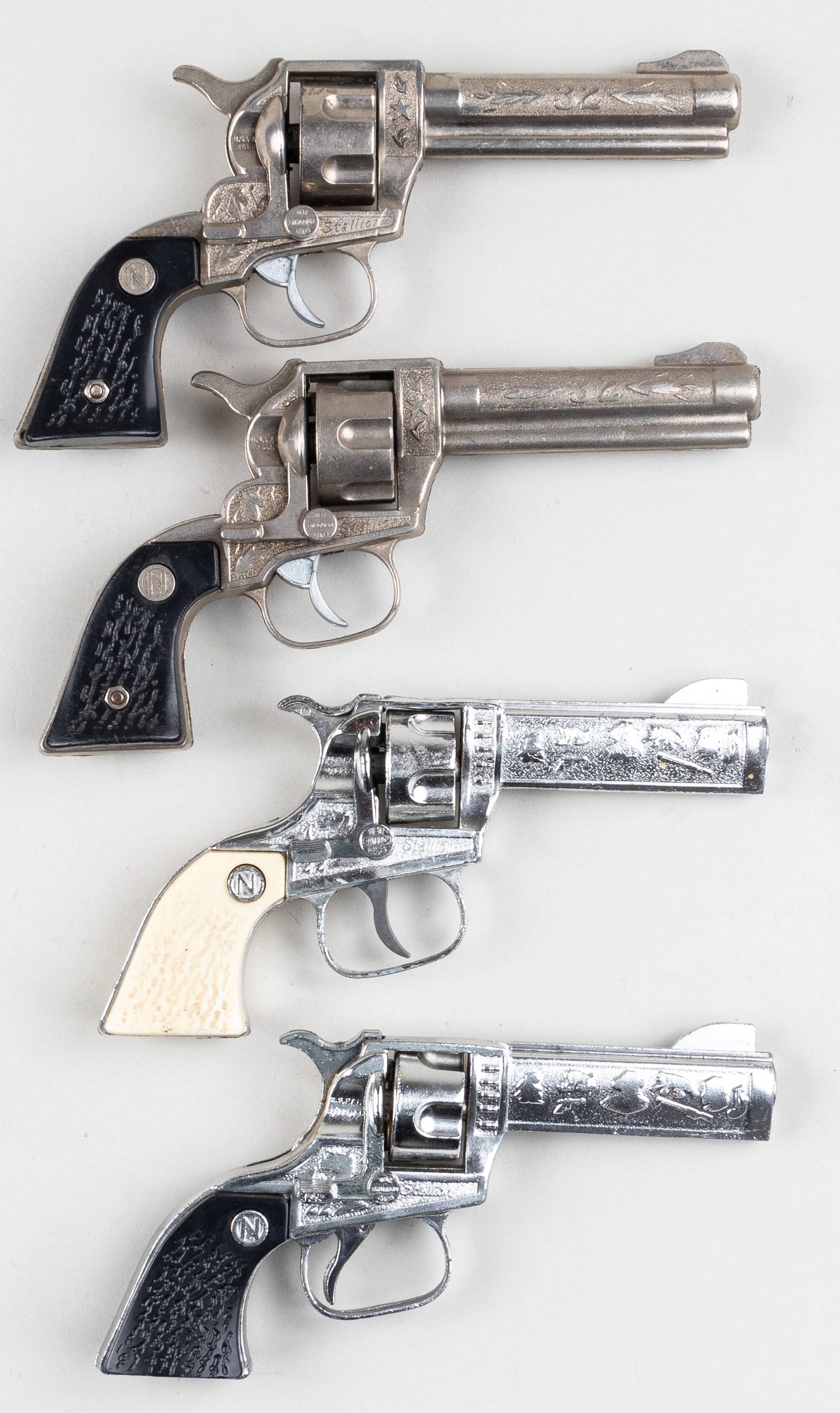4 Nichols Stallion Cap Guns Auction