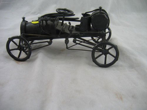 1217103: SIGNED FOLK ART IRON HOT ROD DESK TOP ART PIEC