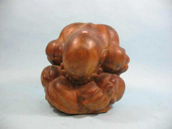 CROUCHING/ WEEPING BUDDHA CARVED WOOD SCULPTURE