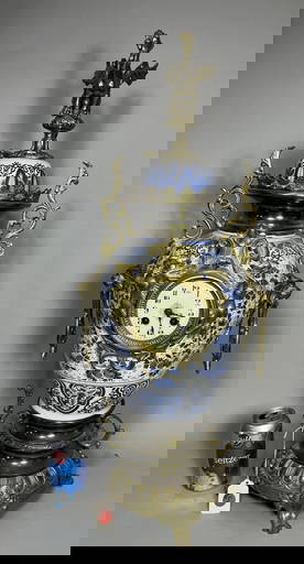 A 27" Bronze Mounted Delft Clock W/ Griffin Phineal, 12" X 10" X 27"