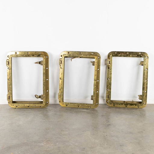 Three Rectangular Portholes, Bronze. (l:17 X W:53 X H:74 Cm)