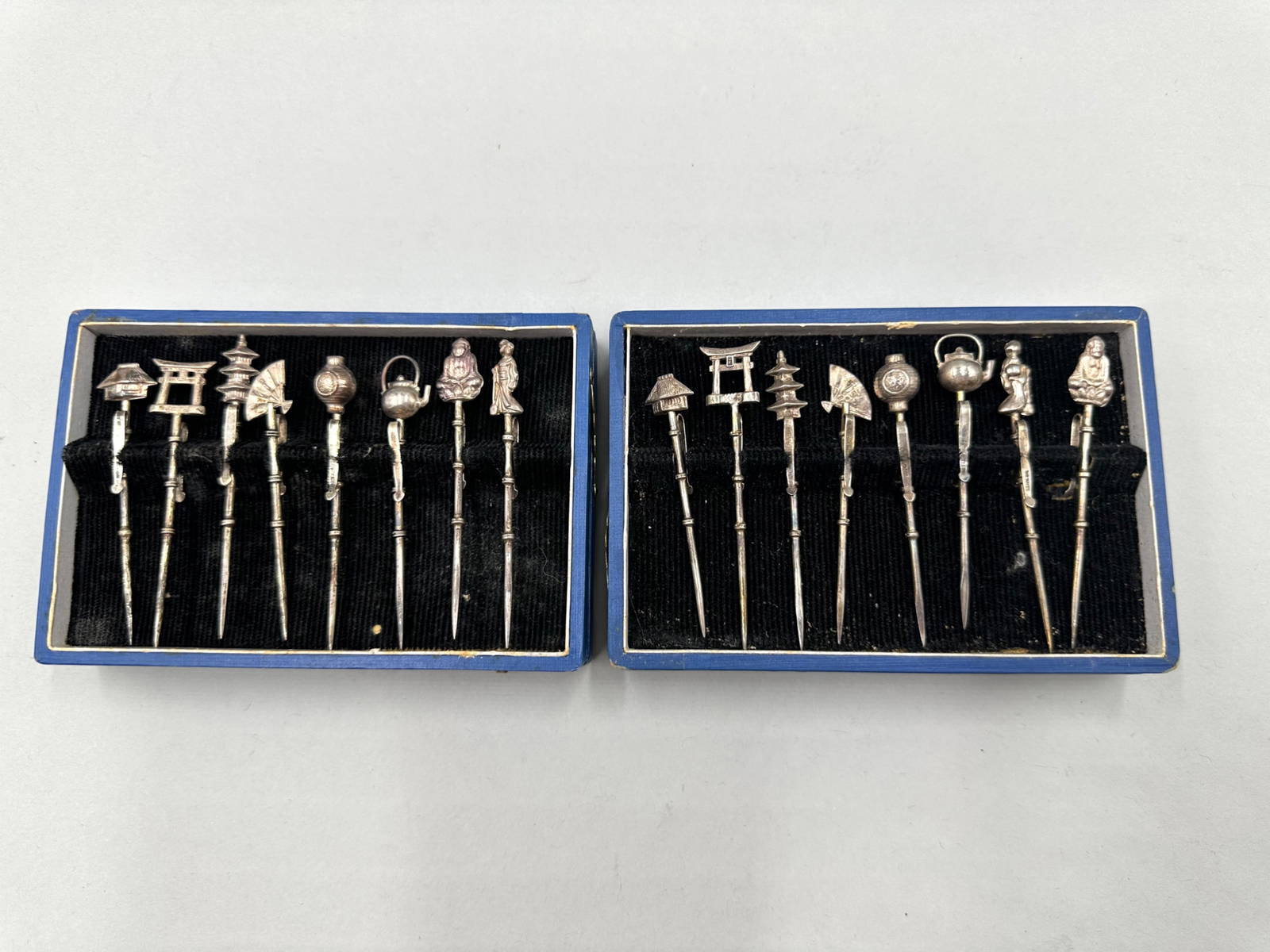 Two Sets Of Sterling Silver Cocktail Picks Auction
