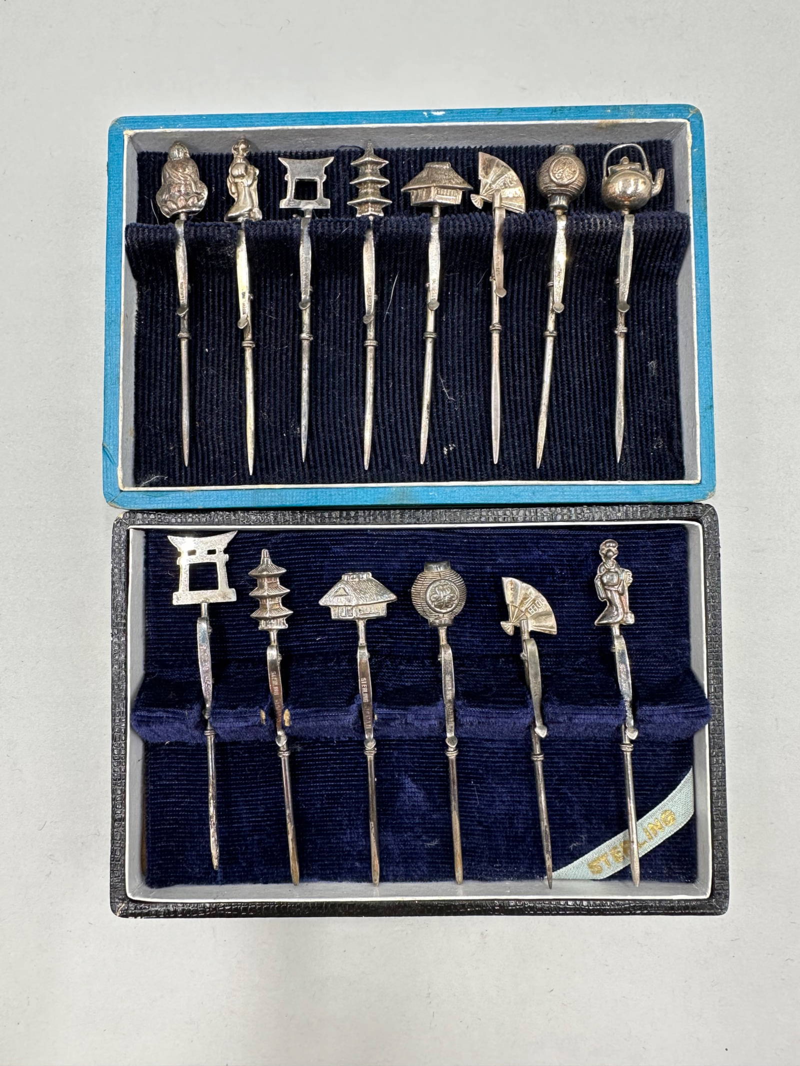 Two Sets Of Sterling Silver Cocktail Picks Auction