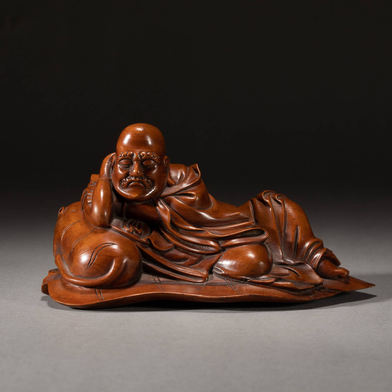 A Chinese Boxwood Luohan Buddha Statue Auction