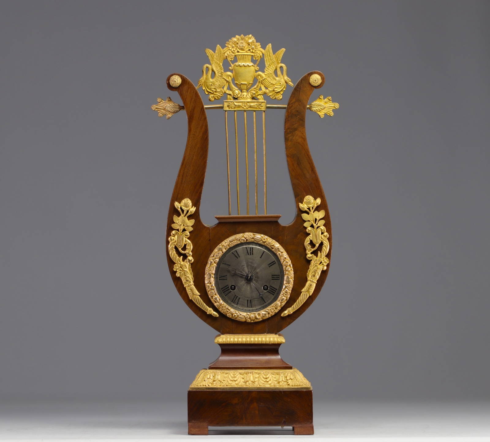 Mahogany Veneered And Gilt Bronze "lyre" Clock, 19th Century. Auction