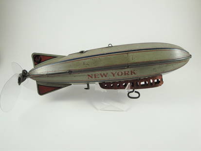 Strauss Tin Wind Up Flying Zeppelin Toy.
