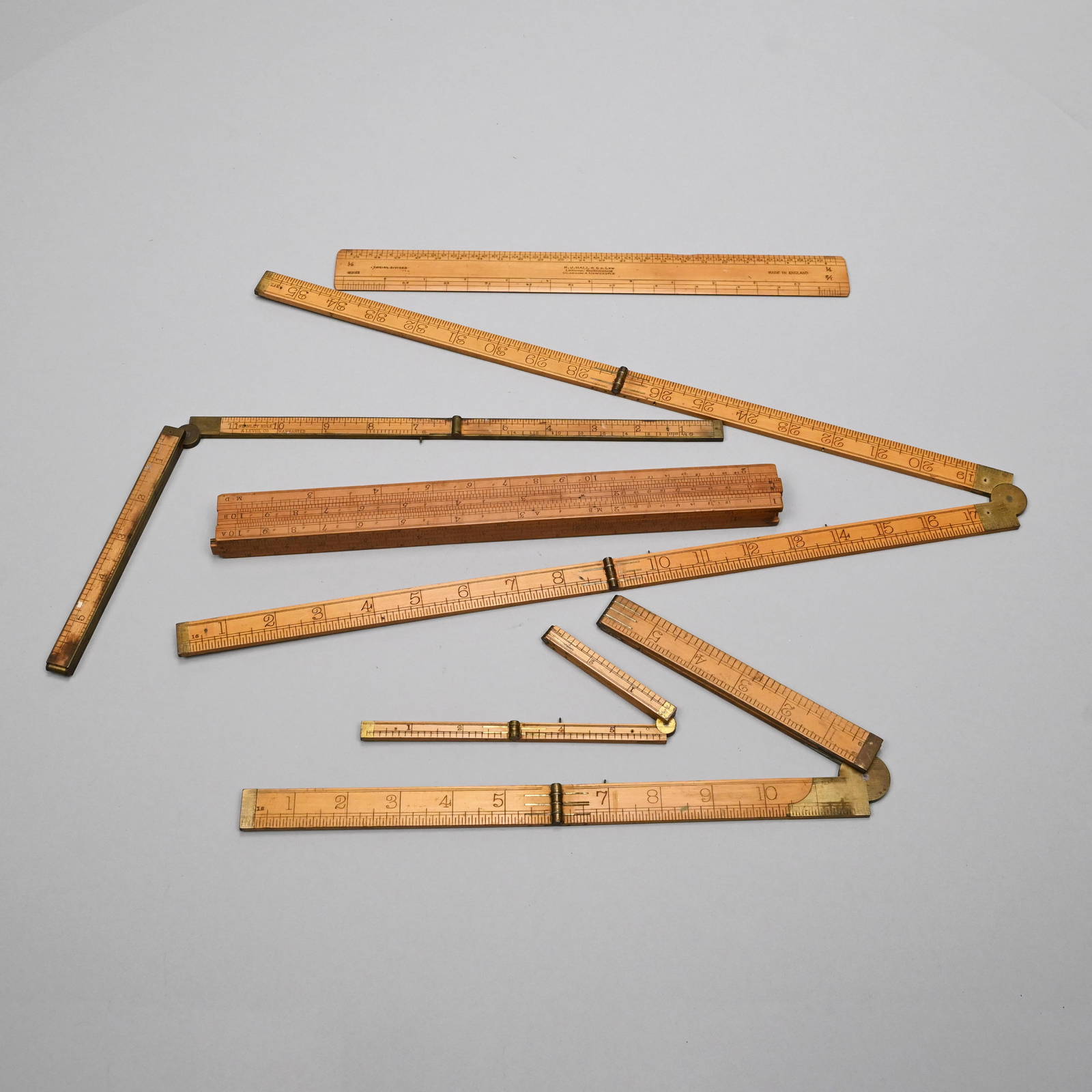 Six English & American Folding & Expandable Rulers Auction