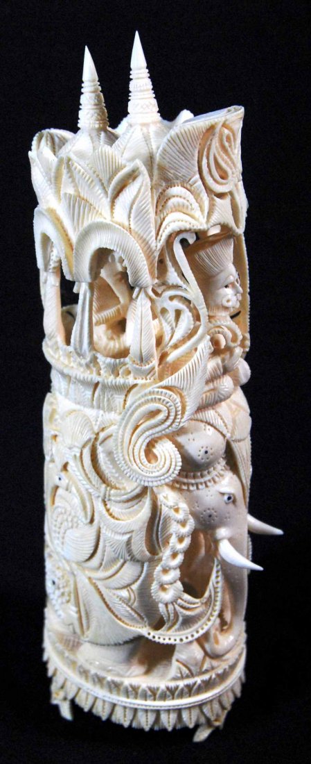 Intricately Carved Ivory Tusk Sculpture