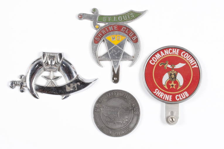 Four Automobile Radiator Badges