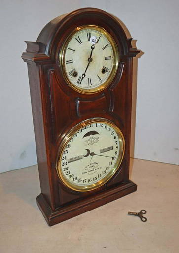 Antique Ithaca Calendar Clock In Mahogany Case