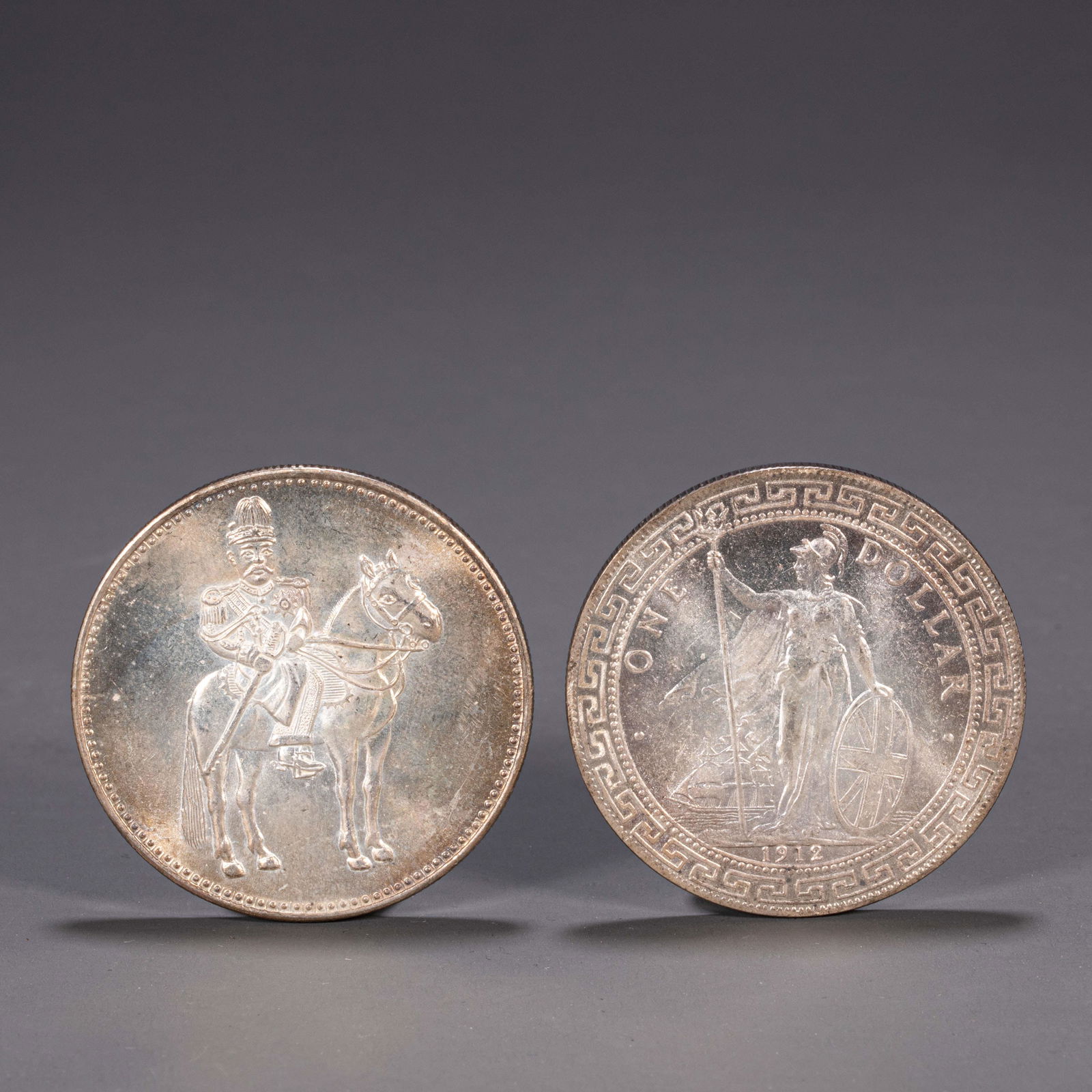 Two Chinese Silver Coins