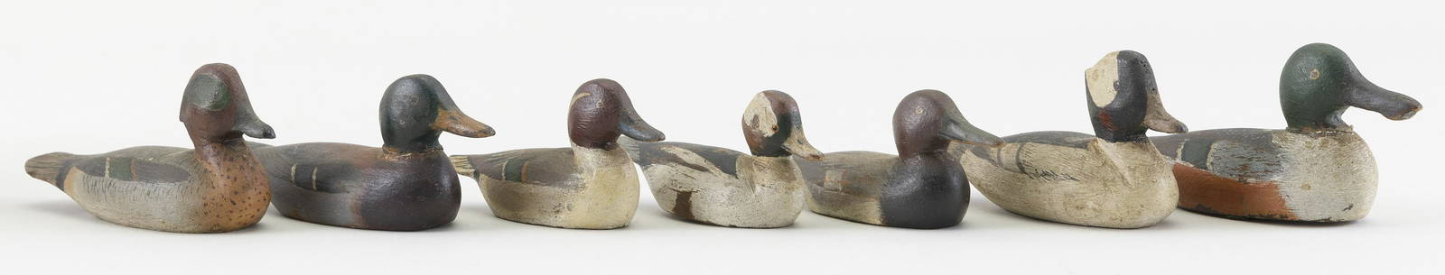 Seven William Reinbold Miniature Waterfowl Carvings