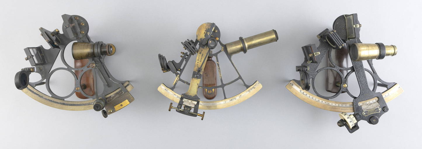 THREE SEXTANTS Late 19th/Early 20th Century Largest length 8". Width 9. ...